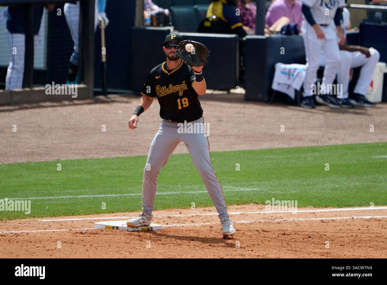 Pittsburgh Pirates first baseman Jared Triolo (19) catching a throw for ...
