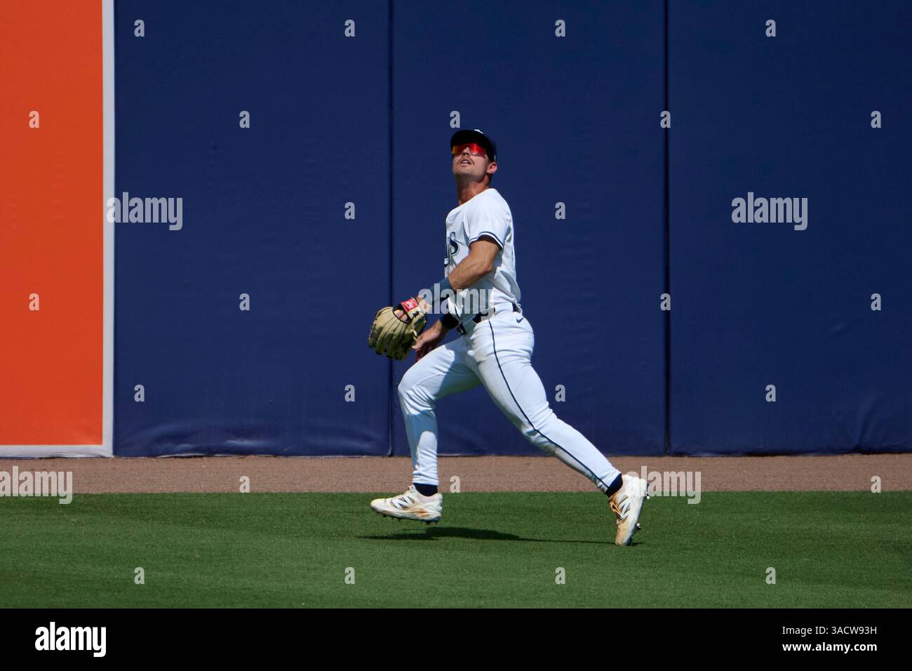 Tampa Bay Rays outfielder Jonny DeLuca (21) gets under a fly ball ...