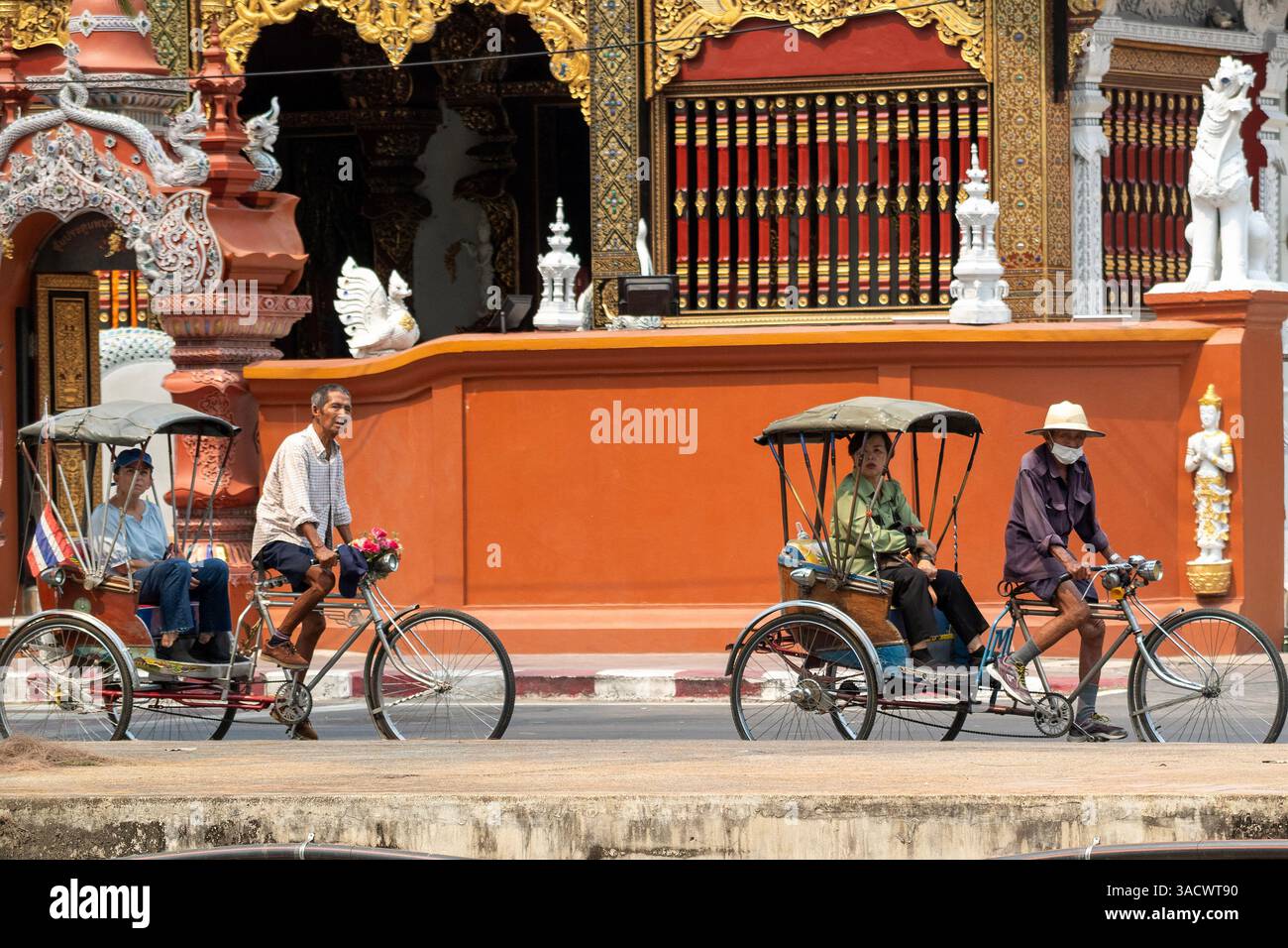 Chiang Mai, Thailand. 4th Apr, 2025. Rickshaw riders and passengers are ...