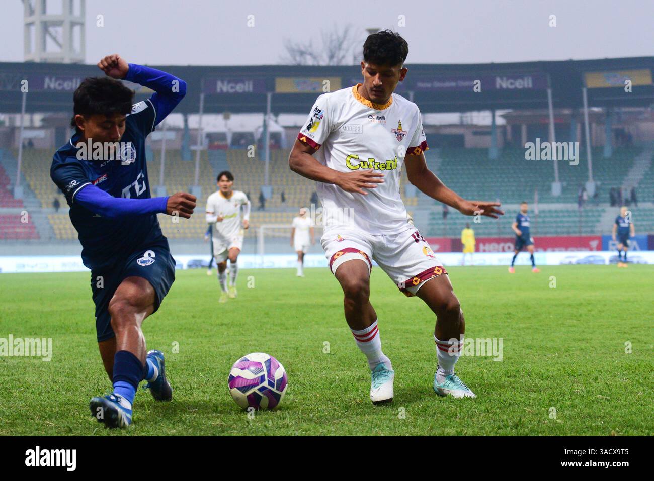 Kathmandu, Bagmati, Nepal. 4th Apr, 2025. SHISHIR LEKHI of FC Chitwan (blue) runs with the ball ...