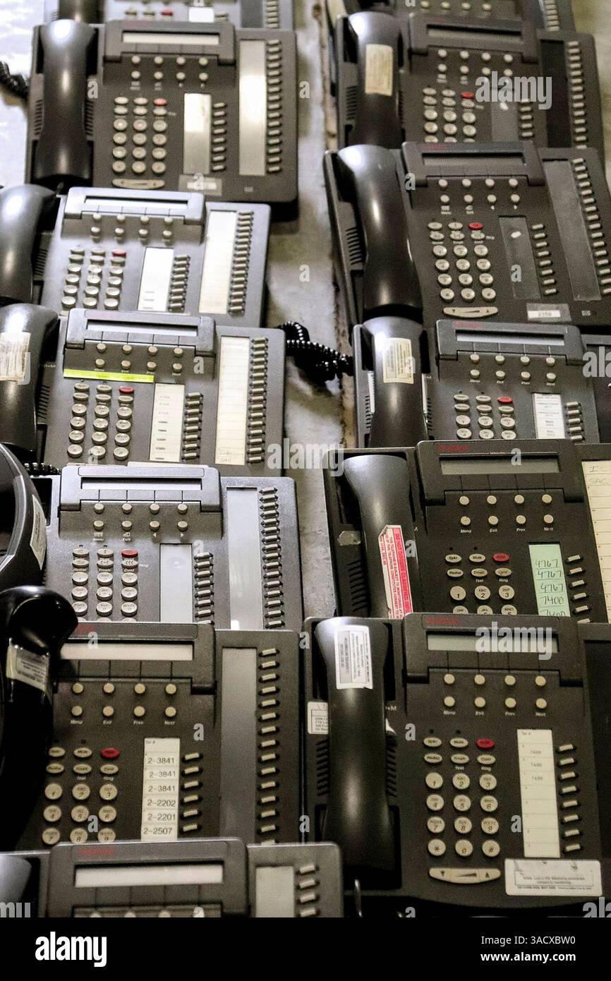 Old desk phones being disgarded Stock Photo - Alamy