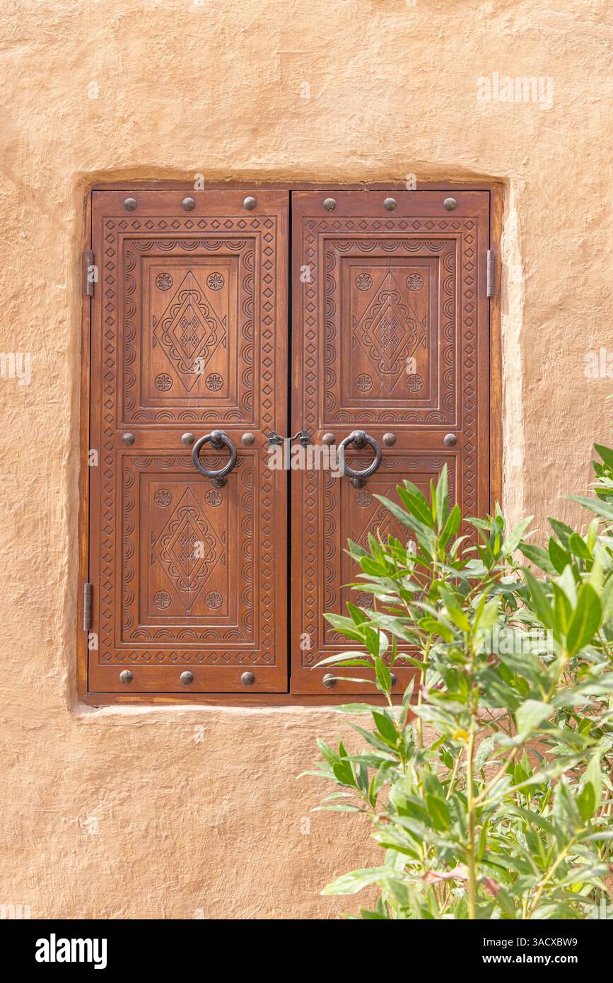 Diriyah, Riyadh, Saudi Arabia. Decorative carved wooden window shutters ...