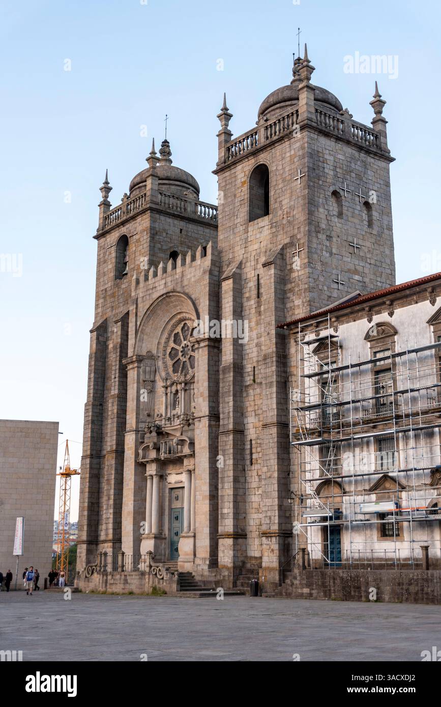 Portal of the gothic cathedral of porto at sunset hi-res stock ...