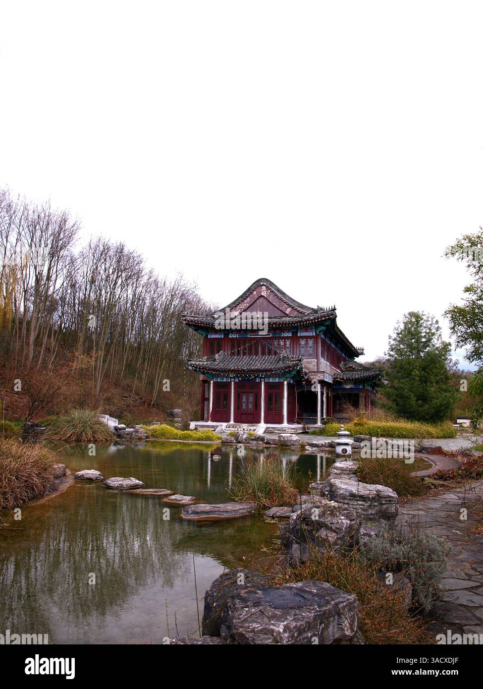 A very idyllic Asian house and pagoda , Chinese (not sure), with its ...