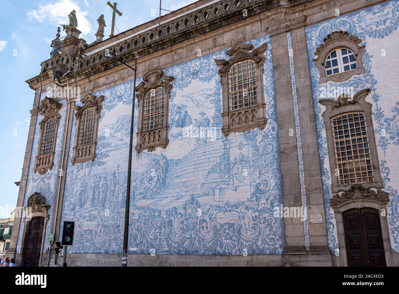 Traditional Azulejo tiles at the facade of Carmo church in Porto center ...