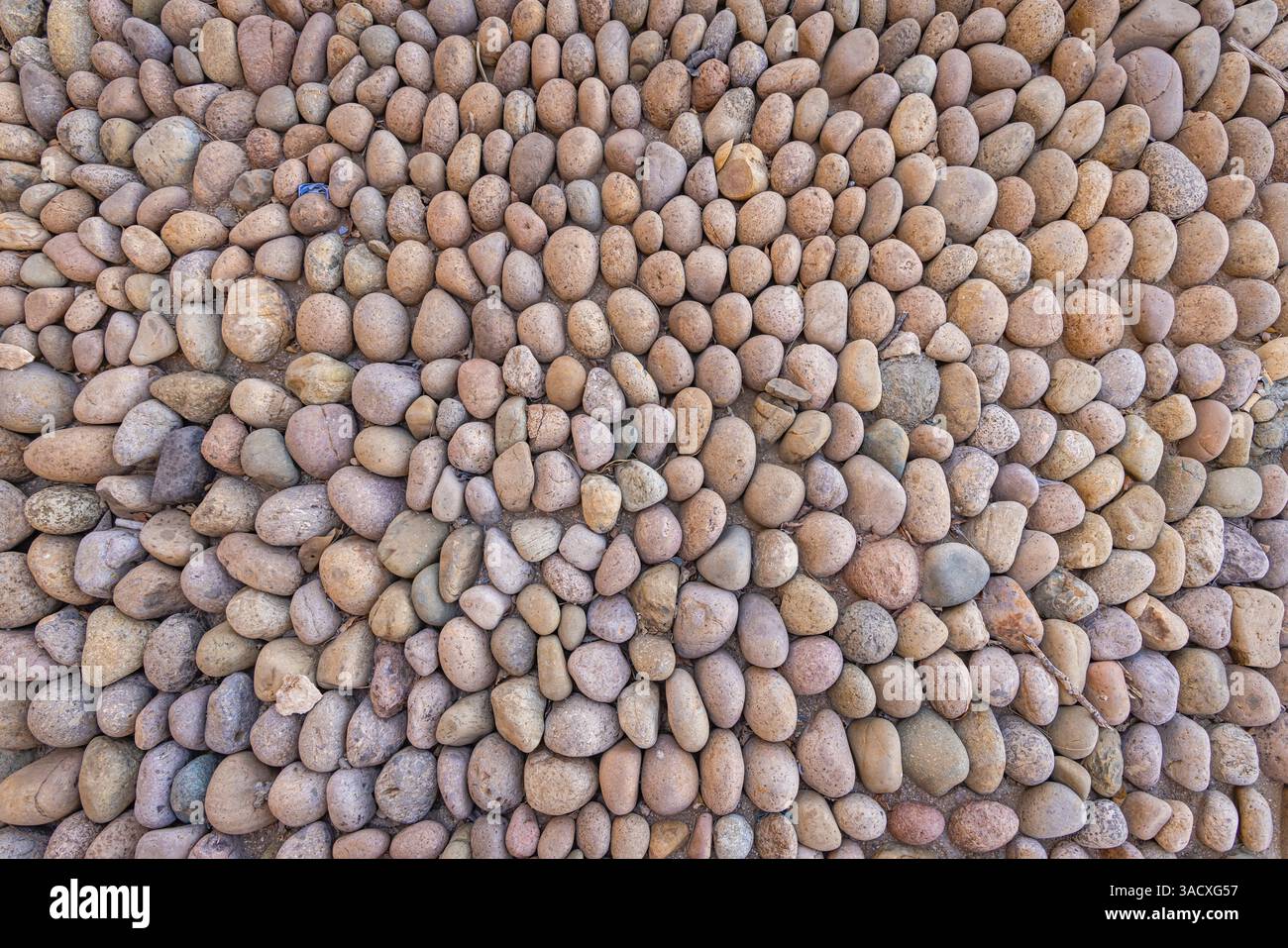 Saudi Arabia, Tabuk, Duba. Wall made of rounded stones Stock Photo - Alamy