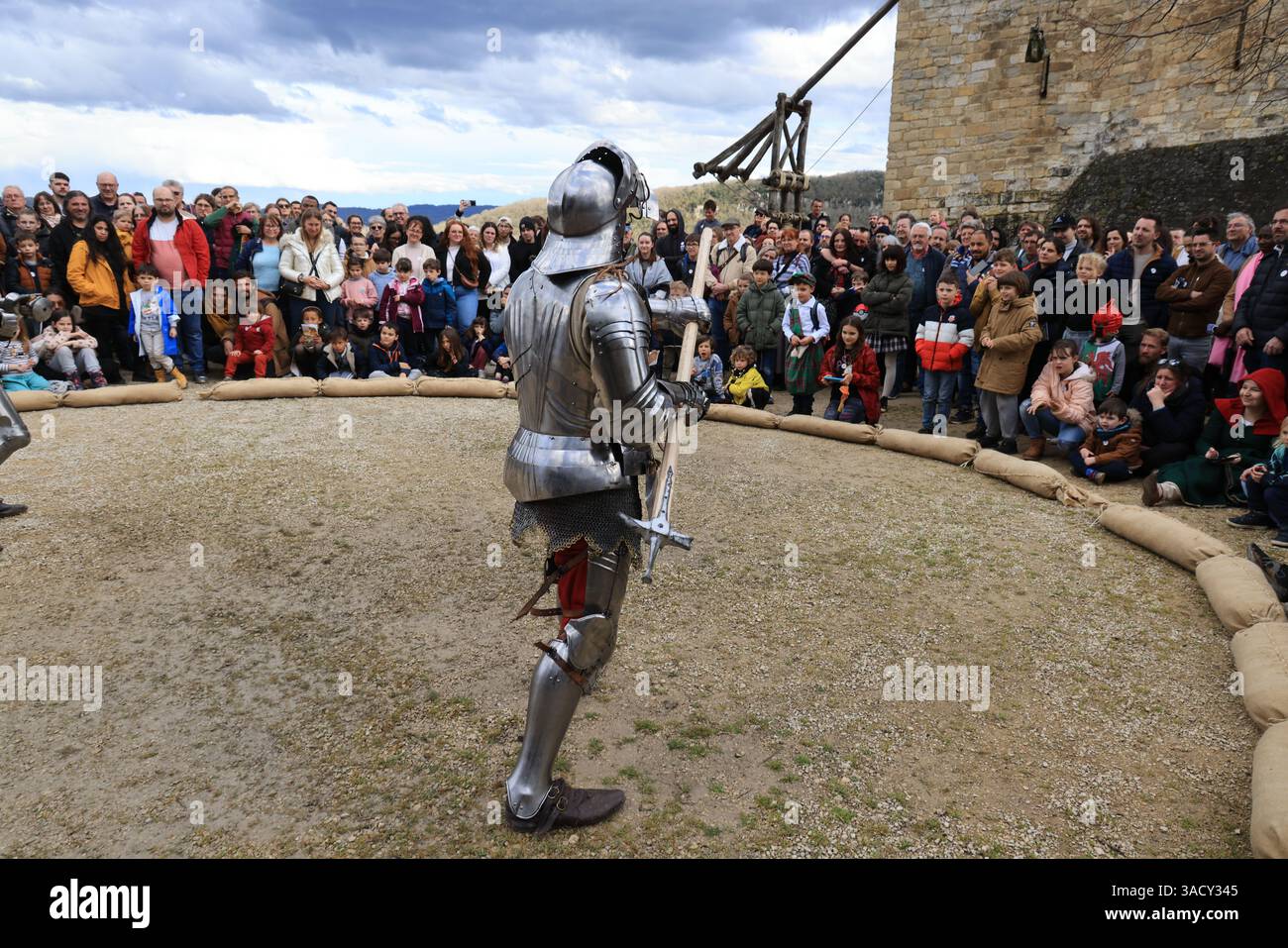 Armored knights fight at the medieval castle of Castelnaud in Périgord ...