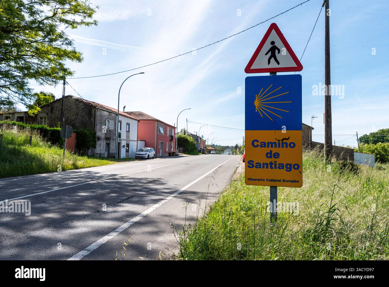 Camino de Santiago sign on a scenic country road, showing pilgrims the ...