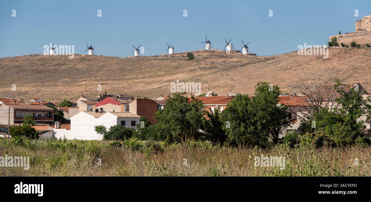 Consuegra village and the iconic ancient windmills and castle on the ...