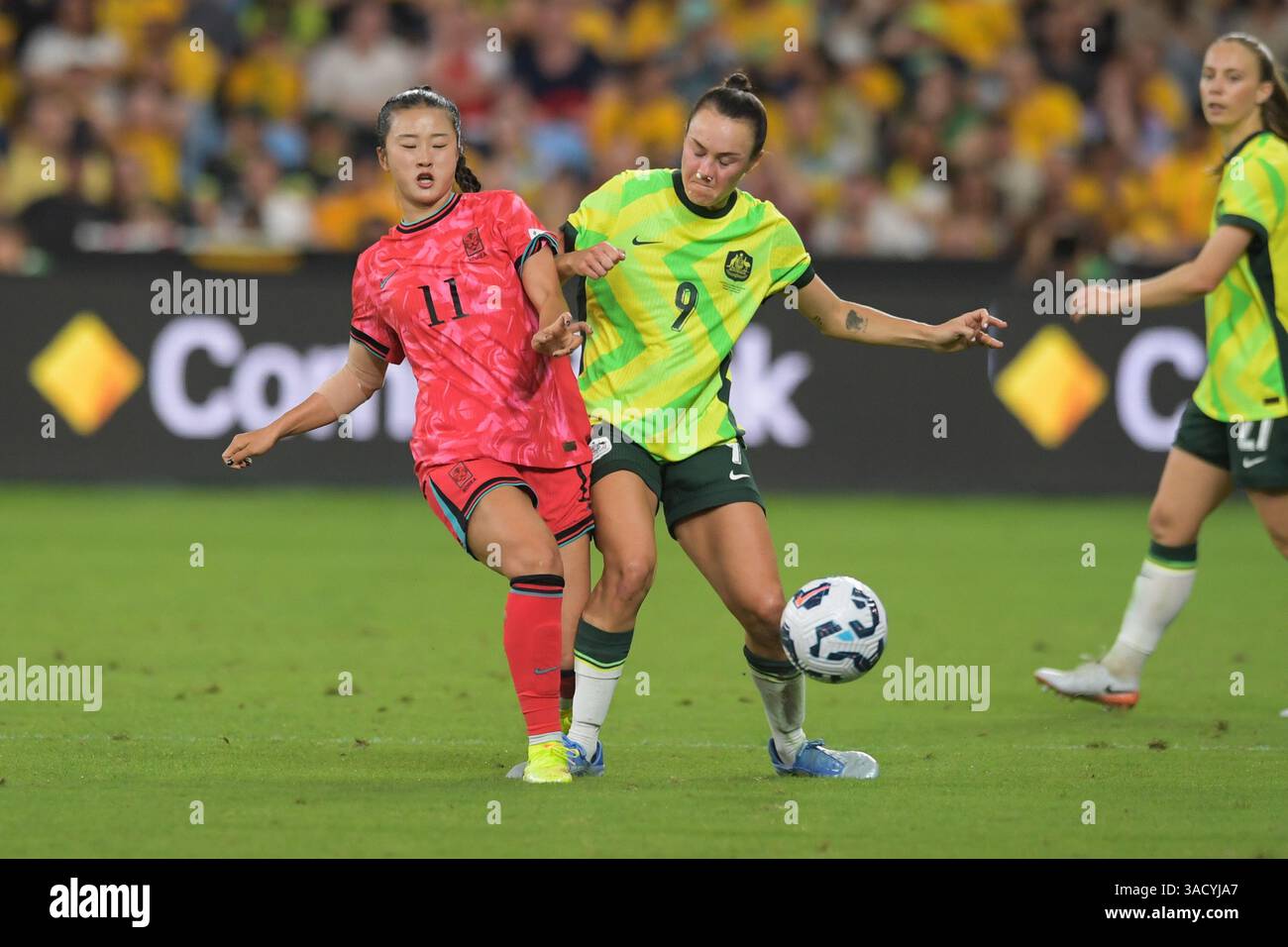 Choi Da-kyeong (L) of Korea Republic women football team and Caitlin ...