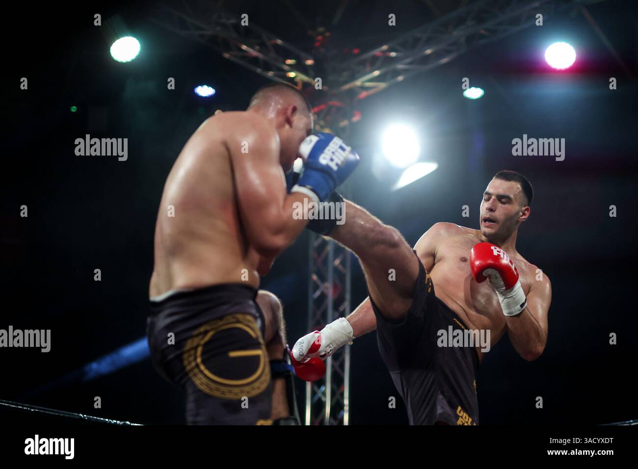 Zagreb, Croatia. 04th Apr, 2025. Matej Mikulic kicks Liam Sabic during ...
