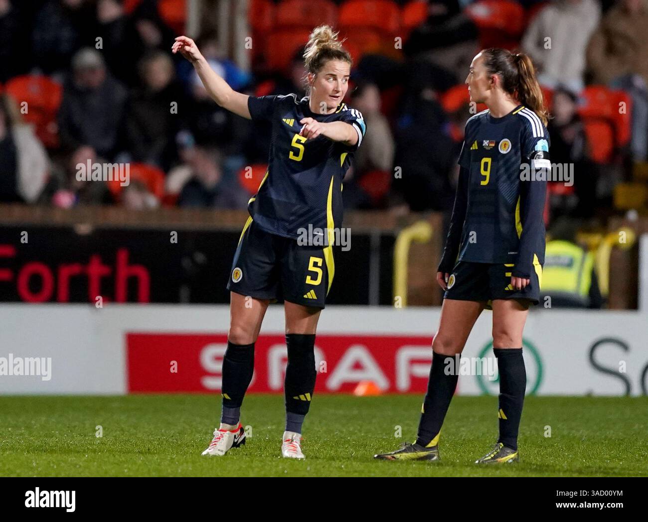 Scotland's Sophie Howard (left) and Caroline Weir react after their ...