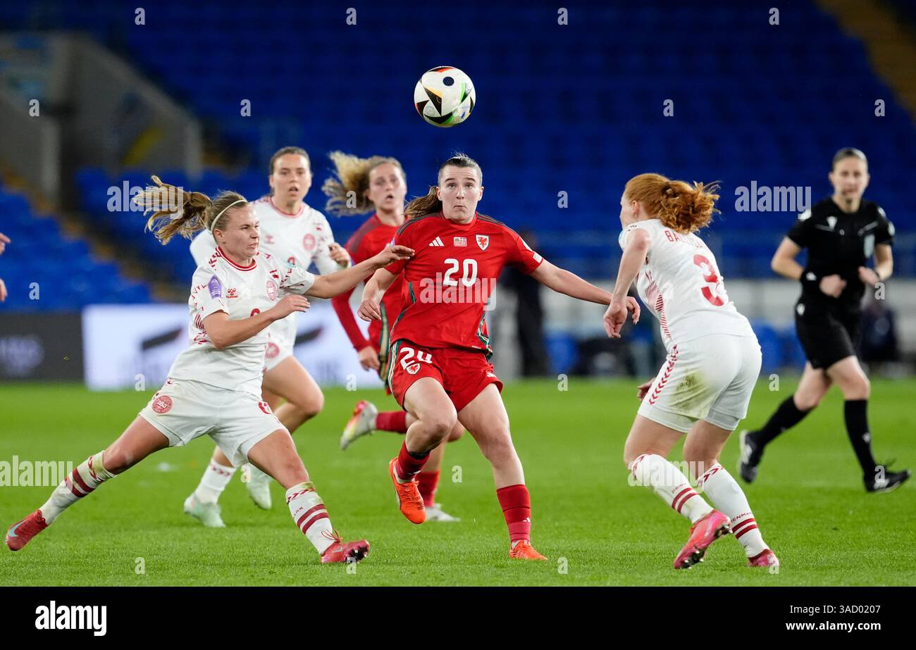 Wales' Carrie Jones (centre) and Denmark's Josefine Hasbo (left) and ...