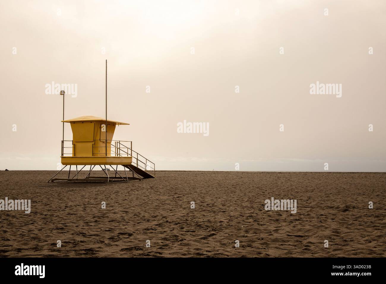 Landscape by the sea, city beach with yellow lifeguard huts on the ...