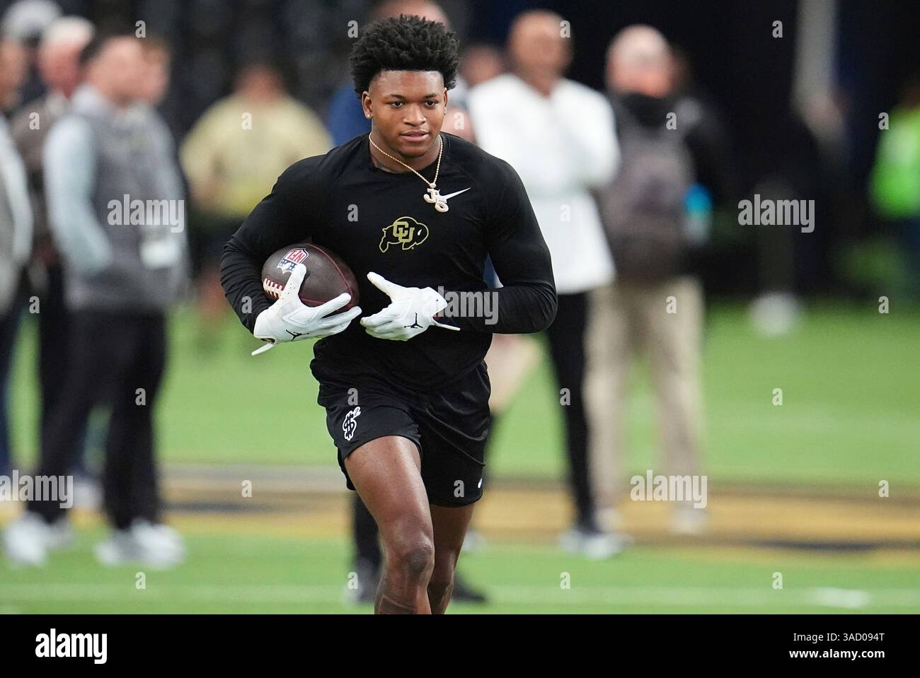 Colorado wide receiver Jimmy Horn Jr. takes part in passing drills ...