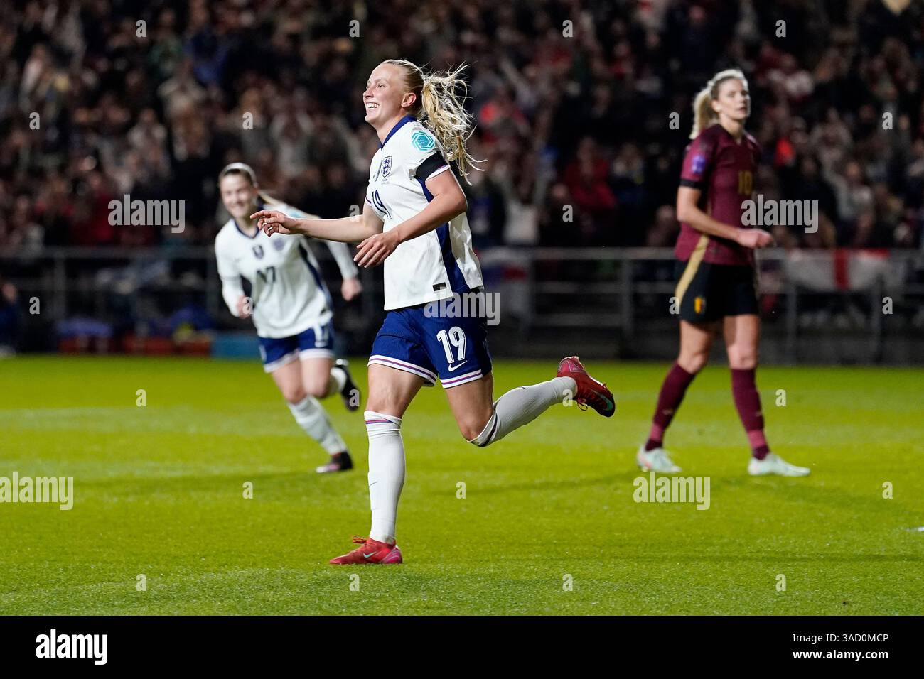 England's Aggie Beever-Jones celebrates scoring their side's third goal ...