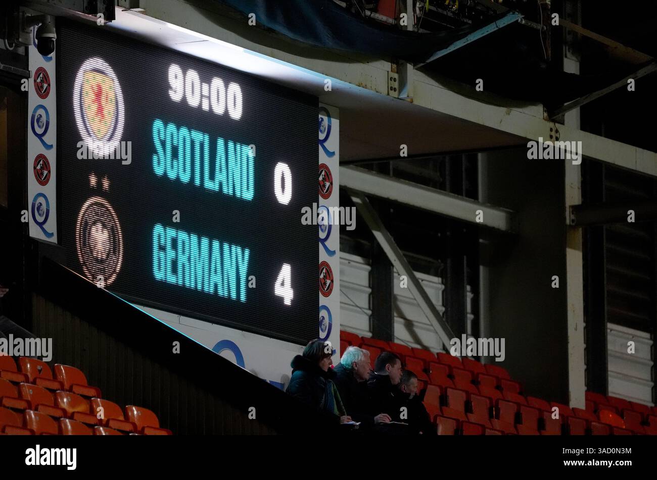 The stadiums score board displays the score in the 90th minute during ...
