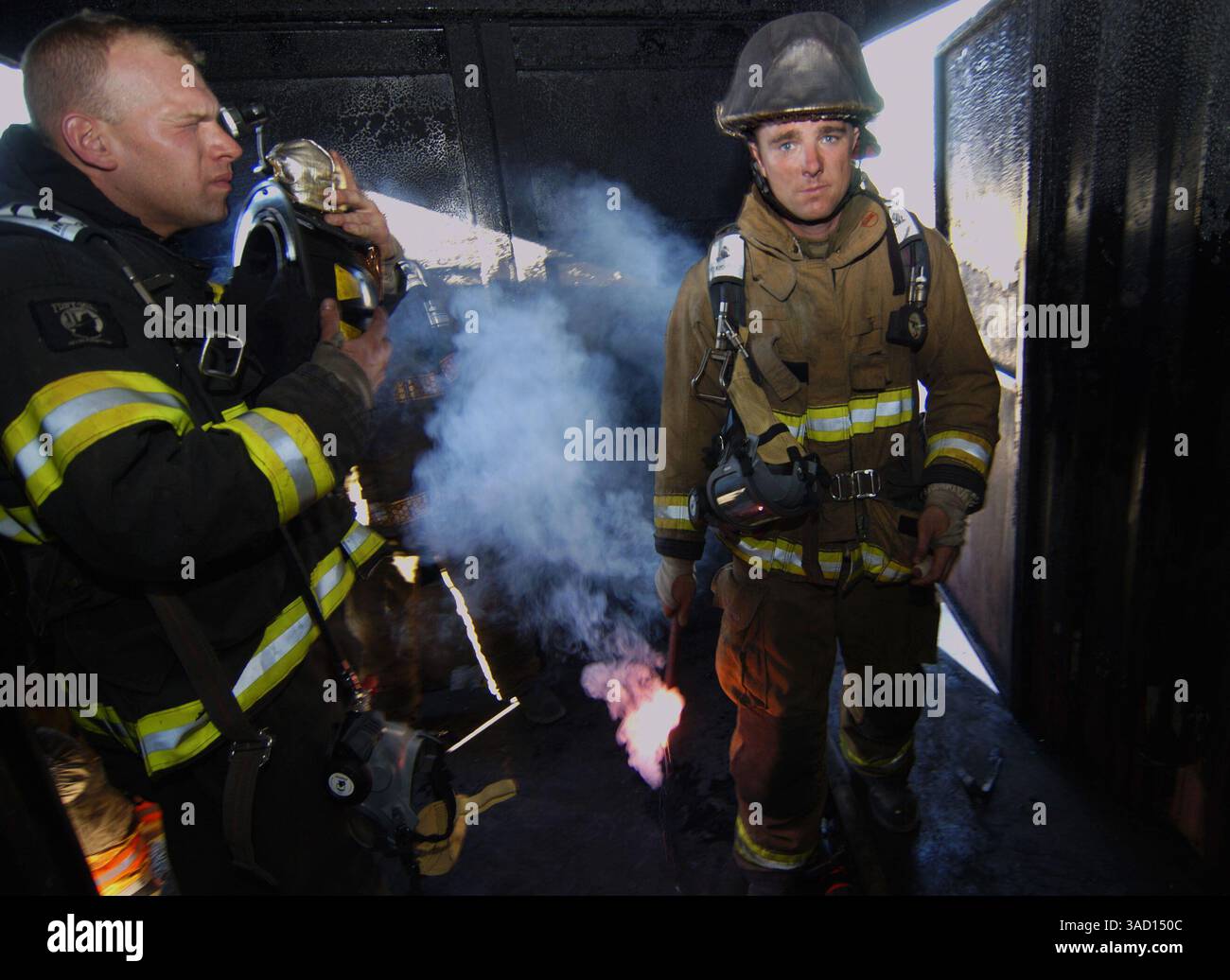 Nov. 10, 2005 - Las Vegas, Nevada, USA - An instructor carrying a fire ...