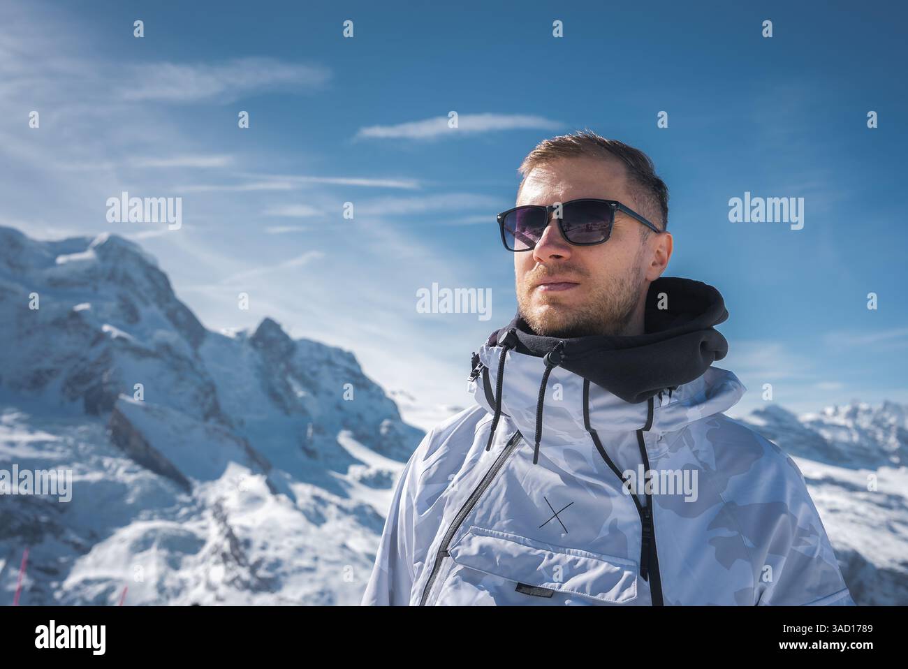 Man in White Winter Jacket with Snow Covered Mountains in Zermatt Stock ...