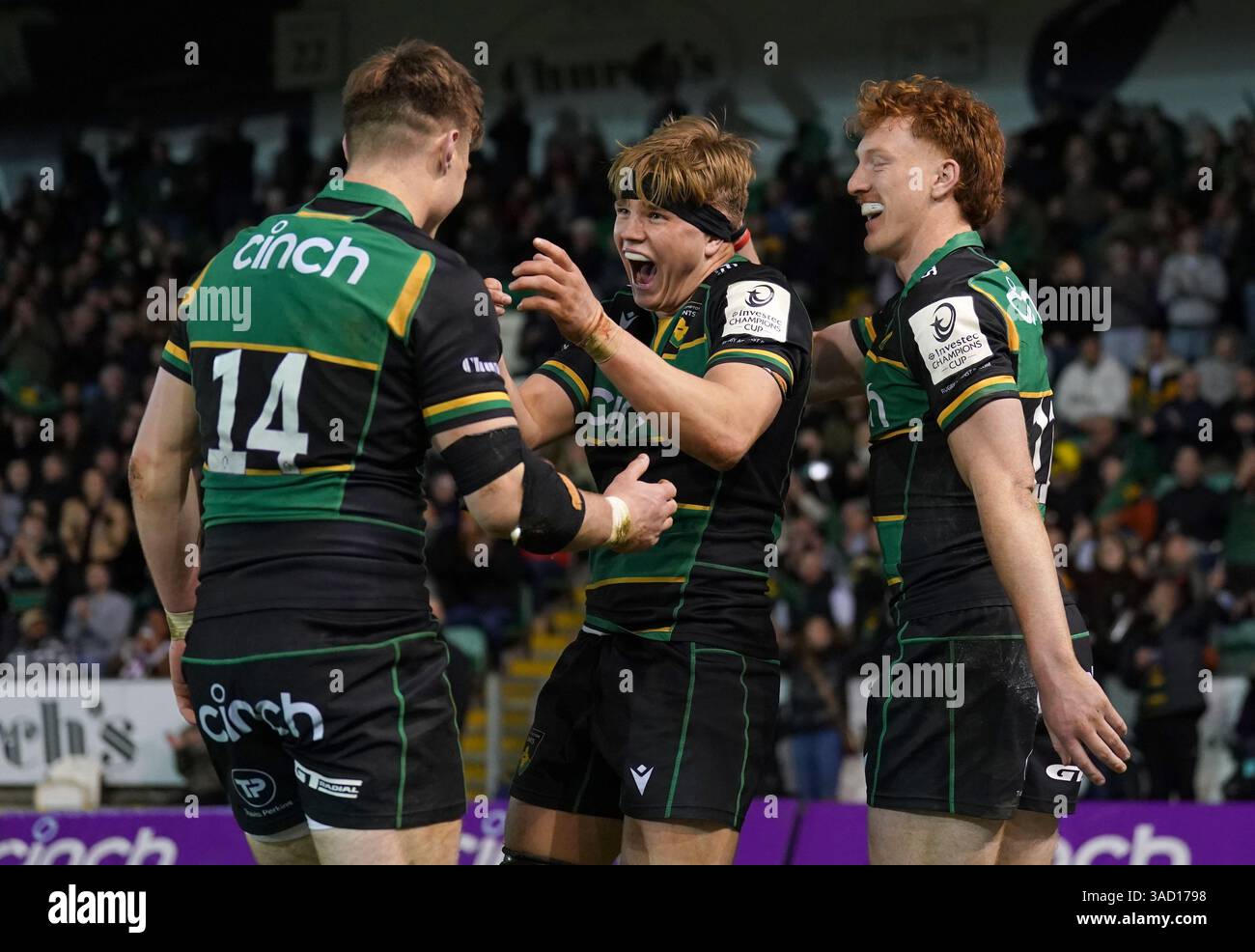 Northampton Saints' Henry Pollock (centre) celebrates after scoring a ...
