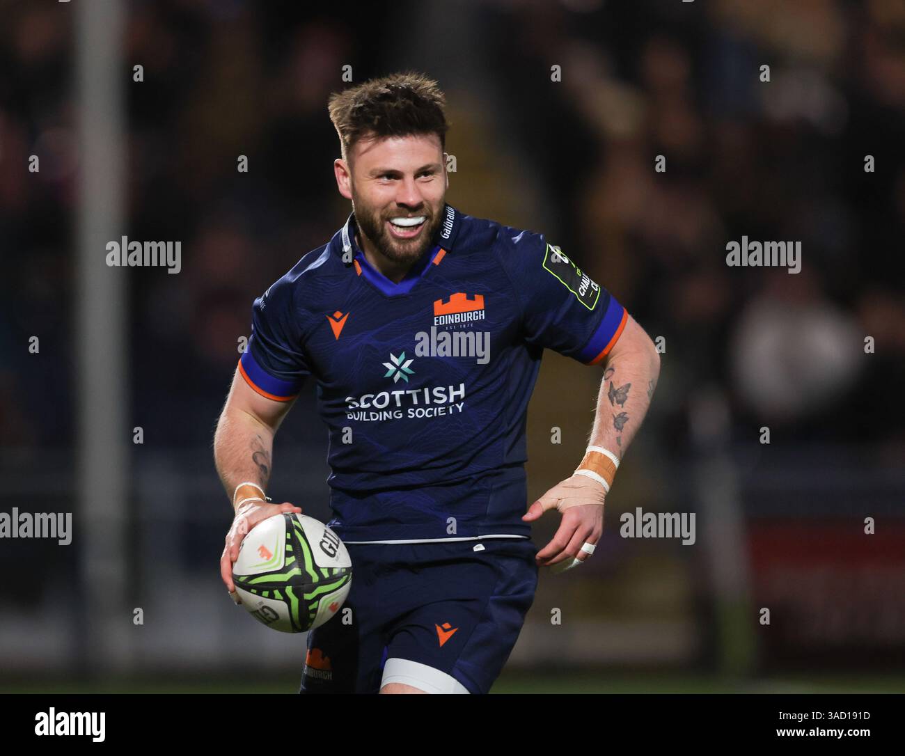 Edinburgh's Ali Price scores try during the EPCR Challenge Cup match at ...