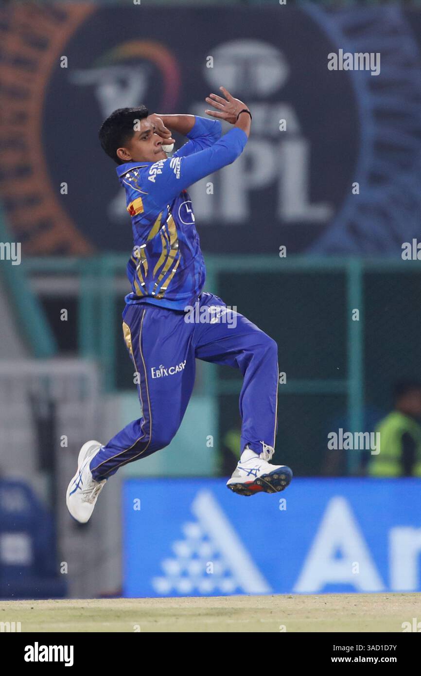 LUCKNOW, INDIA - APRIL 4: Vignesh Puthur of Mumbai Indians bowls during ...