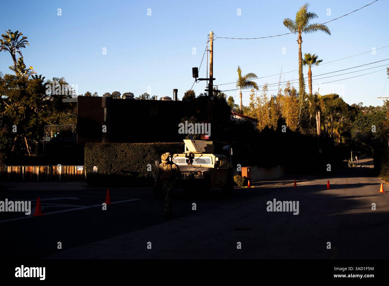 Pacific Palisades, USA. 15th Jan, 2025. A National Guardsman walks in ...