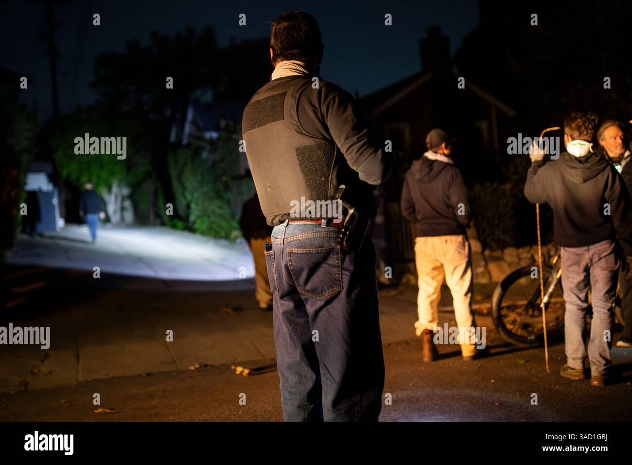 Pacific Palisades, USA. 14th Jan, 2025. A private security guard, who ...