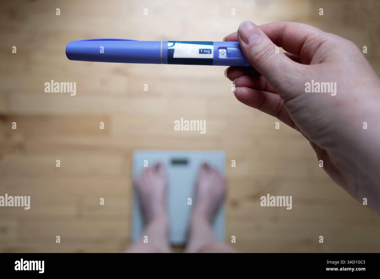 Ozempic Insulin injection pen for diabetics and weight loss. Woman weighs herself and holds ...