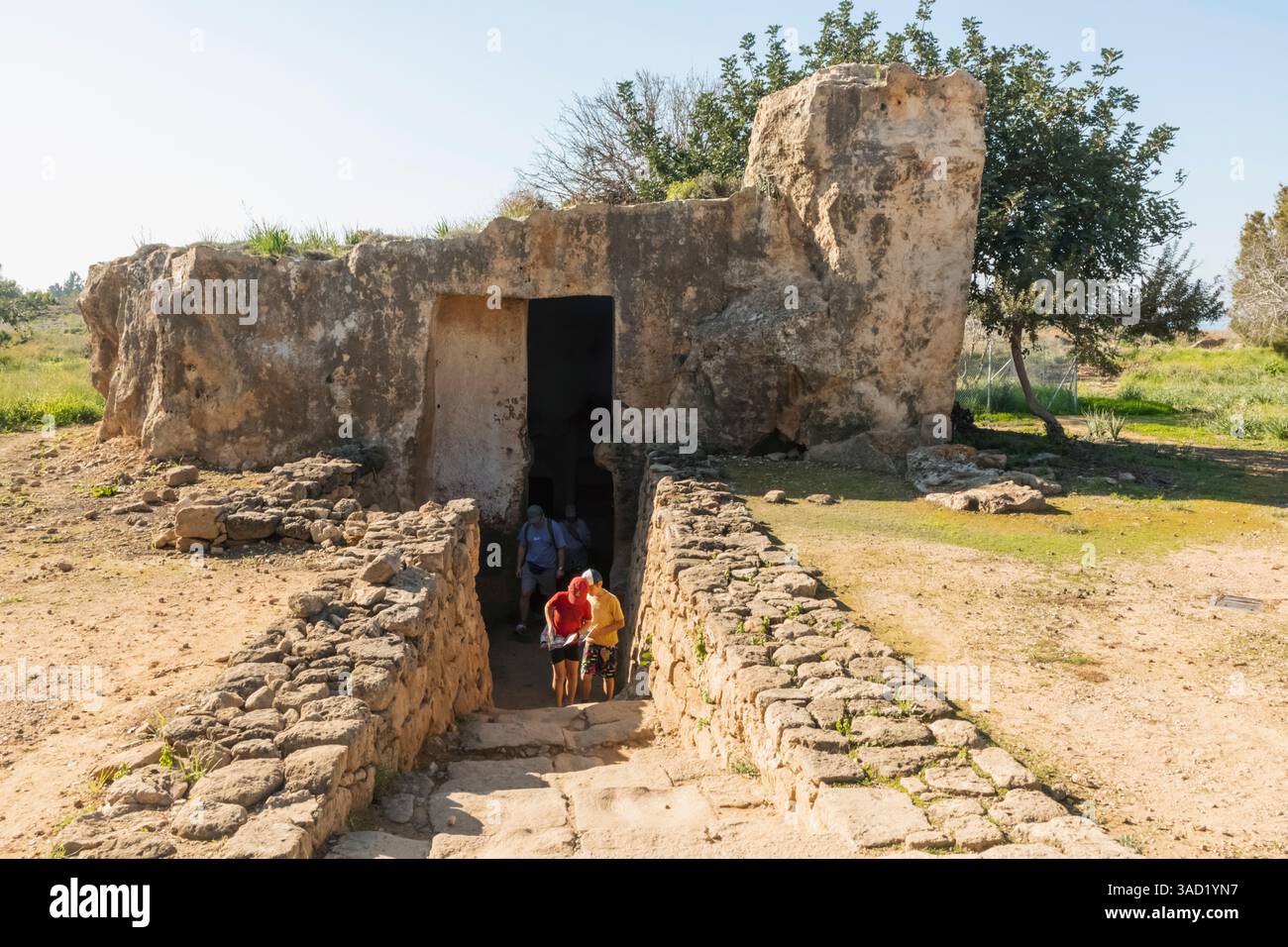Cyprus, Paphos, Tombs of the Kings, Tourists Entering Chamber Tomb ...