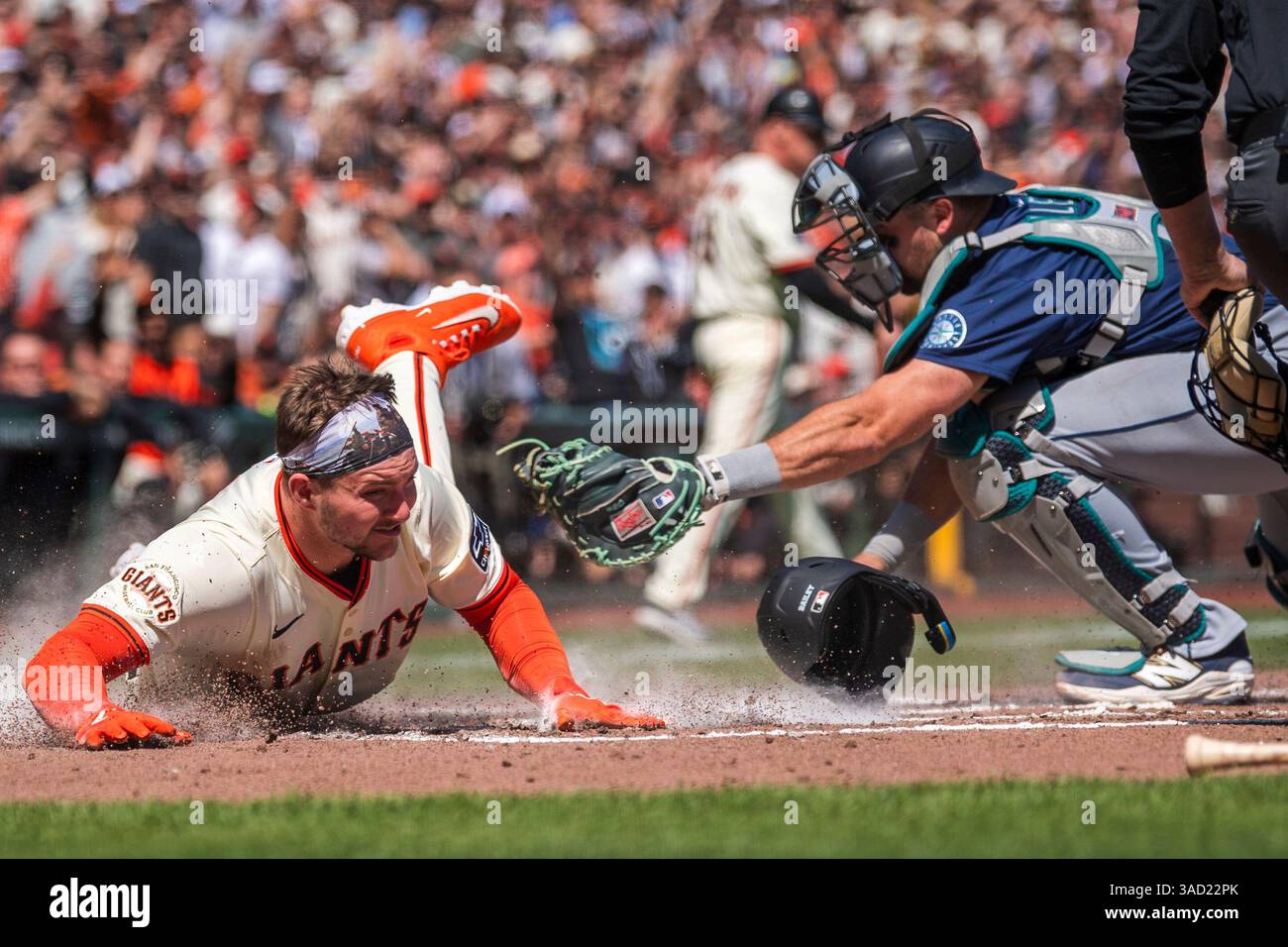 San Francisco Giants' Patrick Bailey slides past the tag by Seattle ...