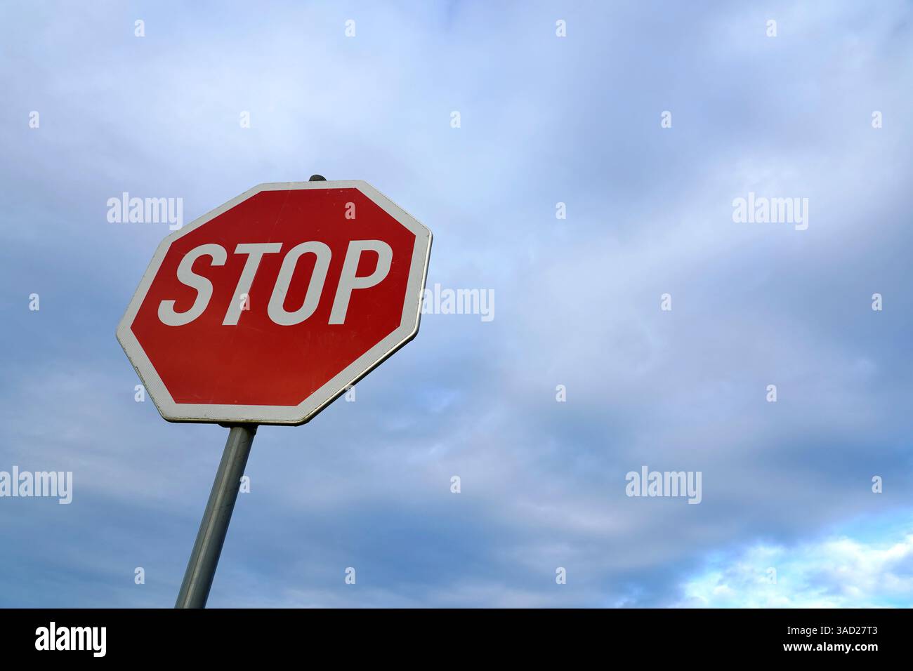 Germany, Bavaria, Neuötting, traffic sign, stop sign, cloudy sky Stock ...