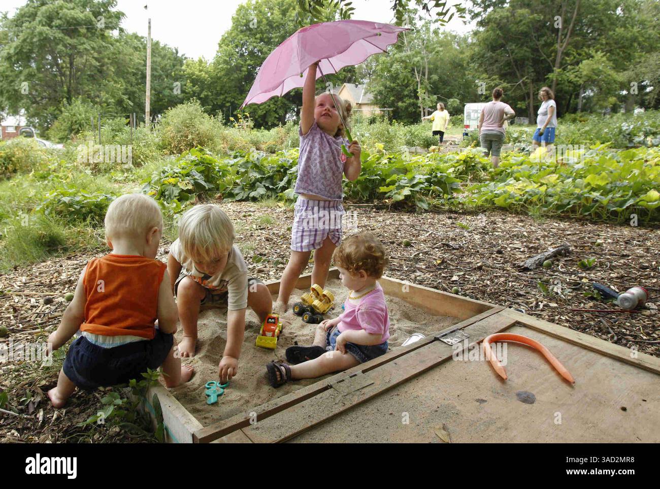 July 30, 2011 - Kansas City, MO, USA - Brothers Asher Fields, 1, and ...