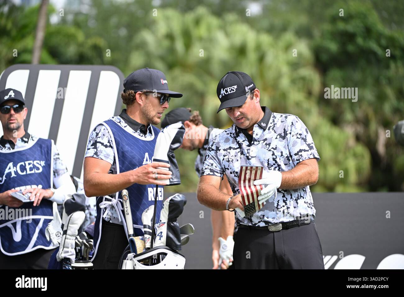 Doral, USA. 04th Apr, 2025. Patrick Reed of the 4Aces GC checks yardage ...