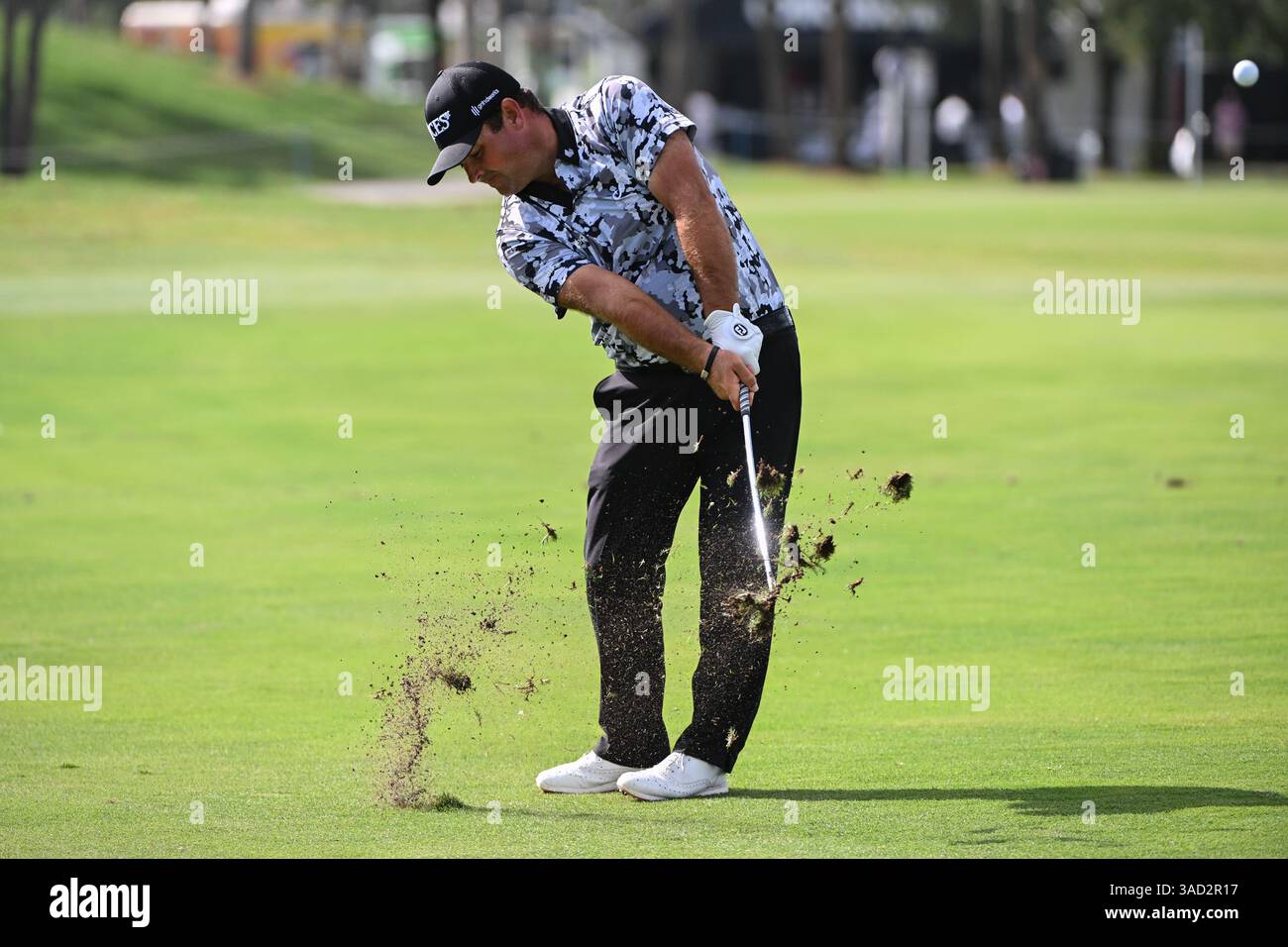 Patrick Reed of the 4Aces GC hits an iron shot during Day 1 of the 2025 ...
