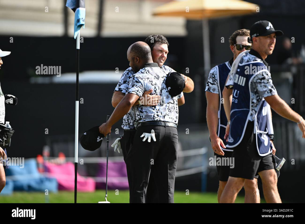 Doral, USA. 04th Apr, 2025. Patrick Reed of the 4Aces GC hugs Harold ...