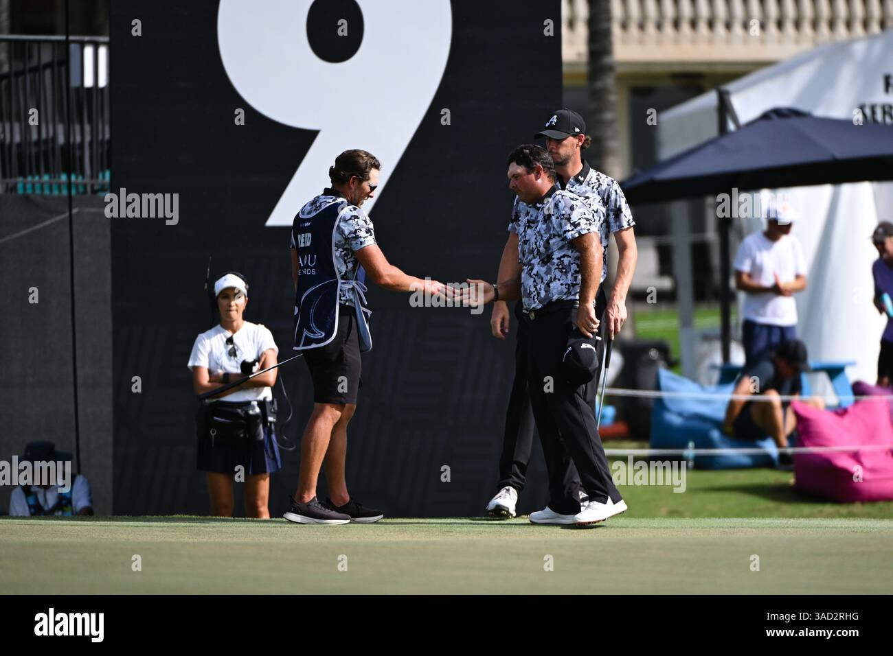 Doral, USA. 04th Apr, 2025. Patrick Reed of the 4Aces GC and his caddie ...
