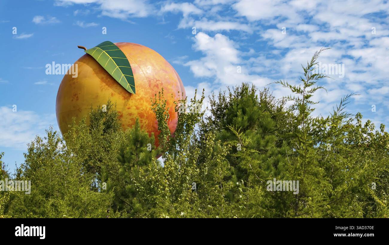 The Peachoid, a 135-foot water tower in Gaffney, SC, resembles a peach ...