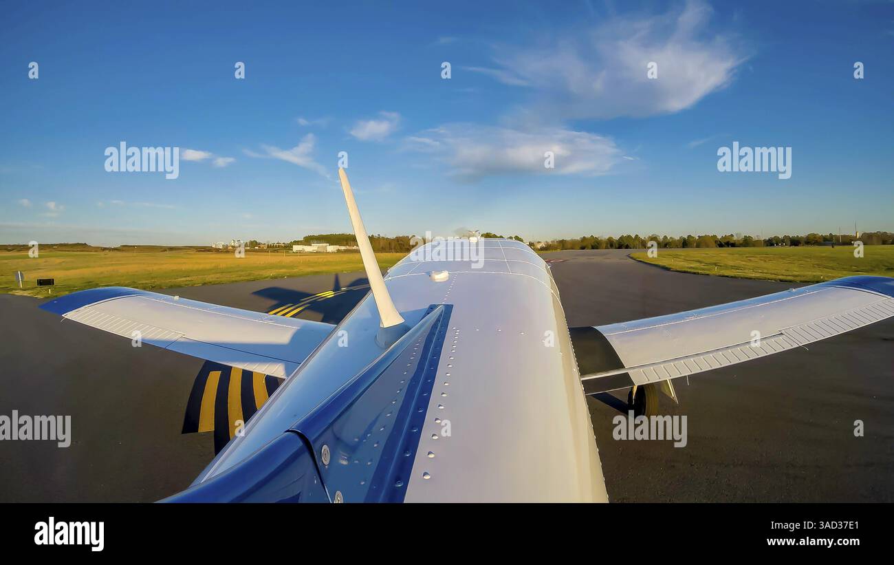 A small general aviation aircraft, its pre-takeoff checklist complete ...