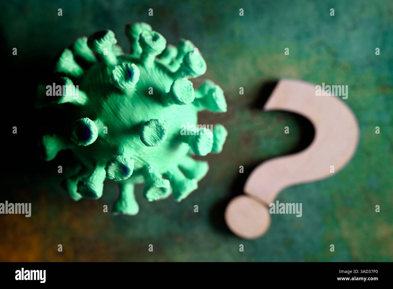 Coronavirus model and question mark, symbolic photo of the unknown ...