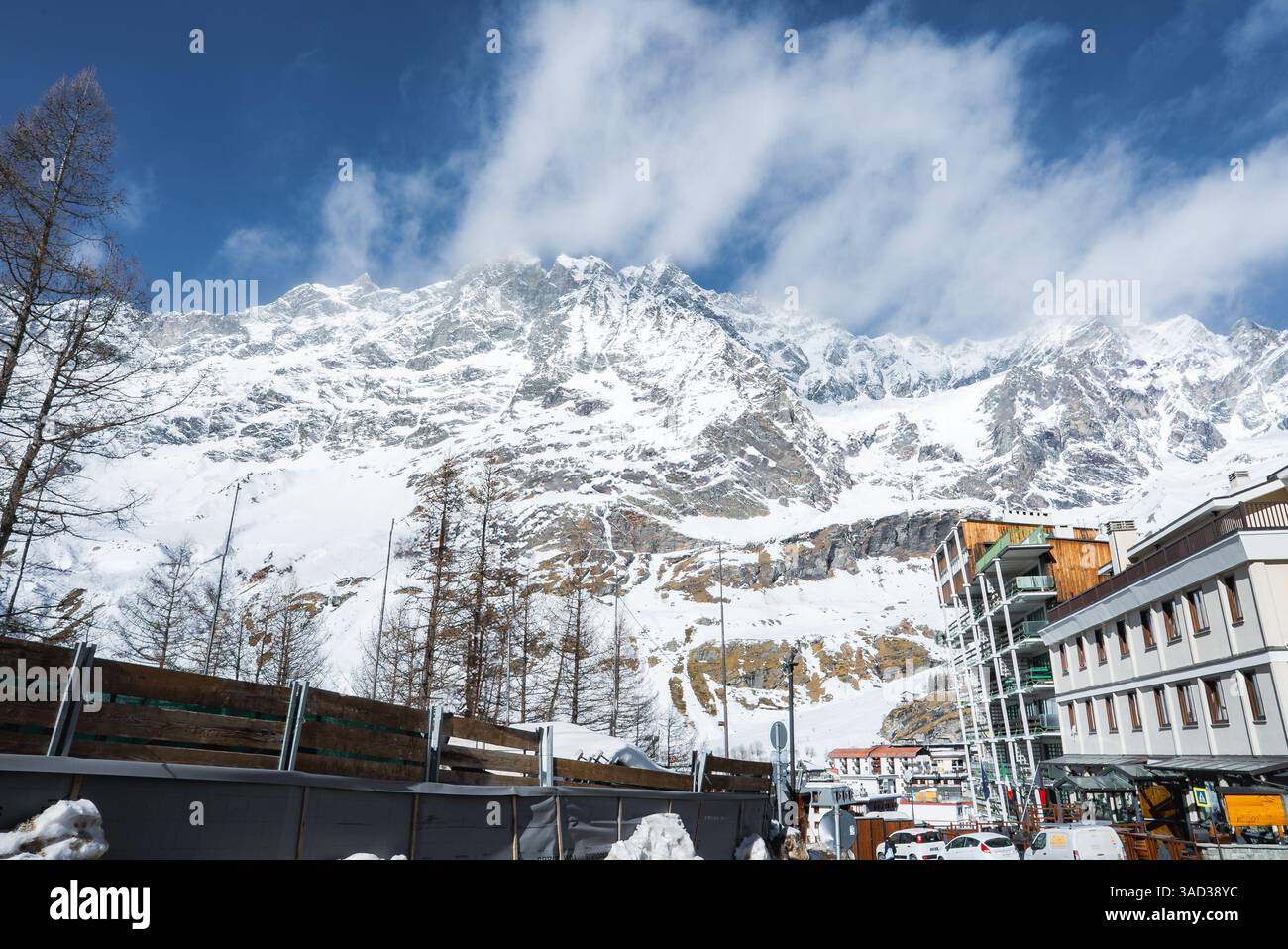 Snow Covered Mountains and Modern Buildings in Cervinia, Italy Stock ...