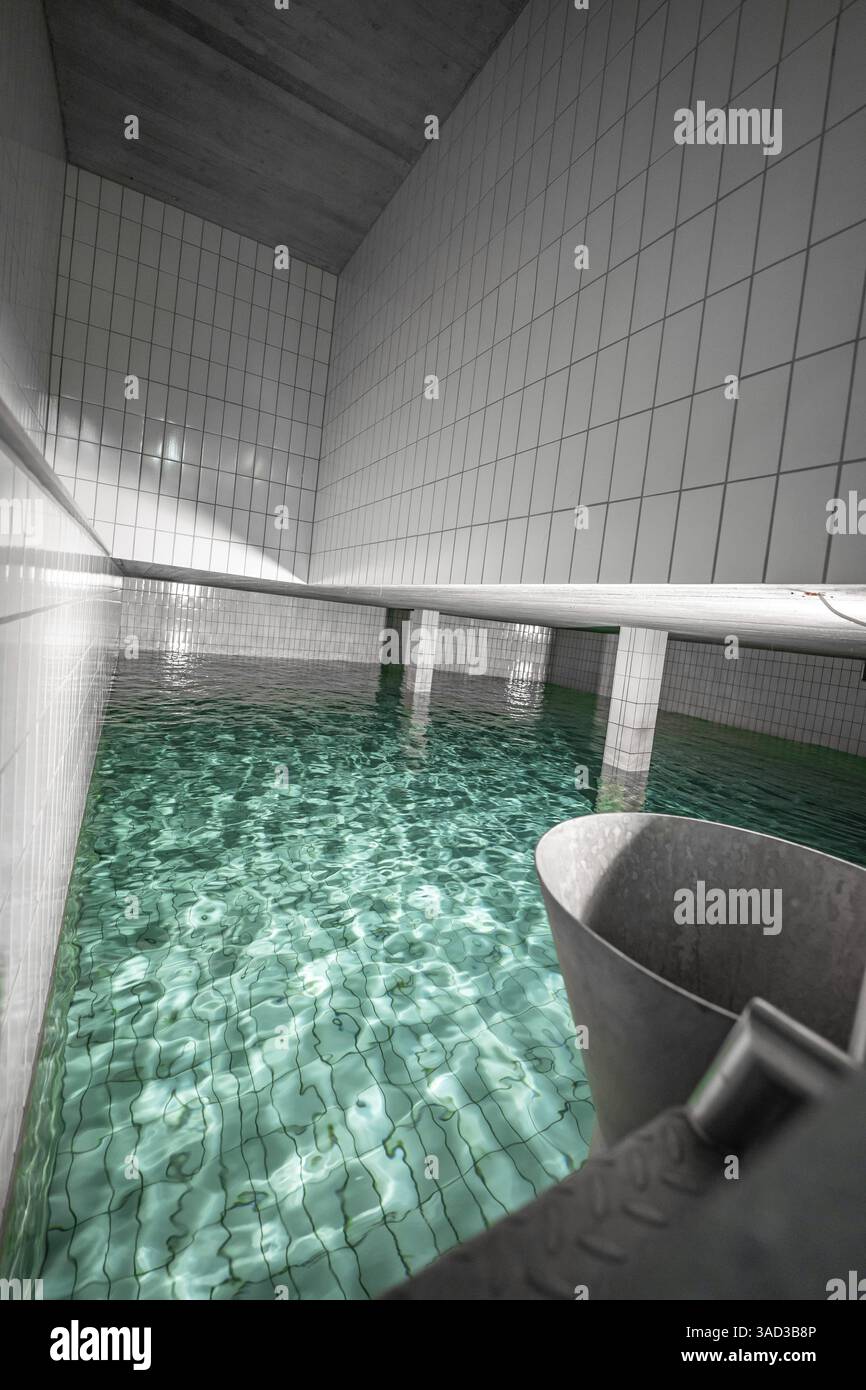 Modern water basin with white tiles and clear water surface, ENCW Netze Calw waterworks, Calw ...