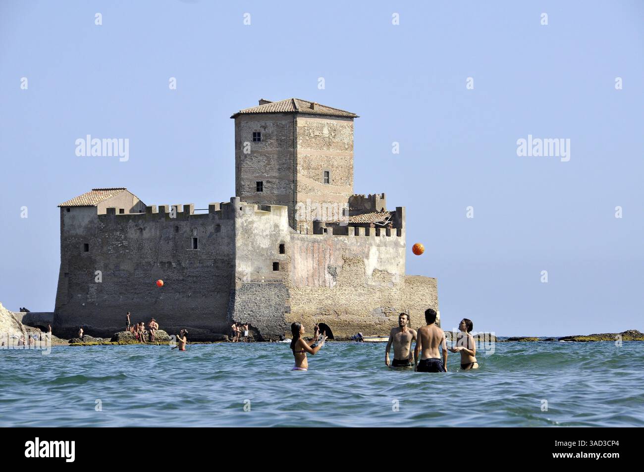 Group of young people playing ball on the beach, water polo, medieval ...