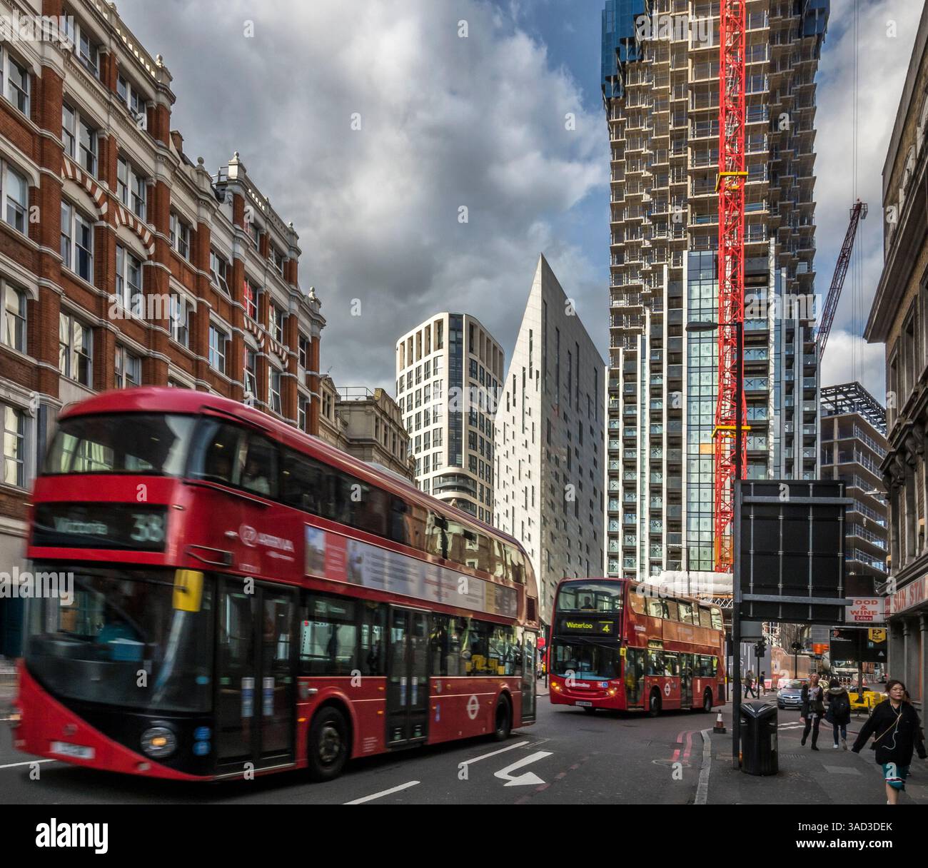 Red city buses in the city of London Stock Photo - Alamy