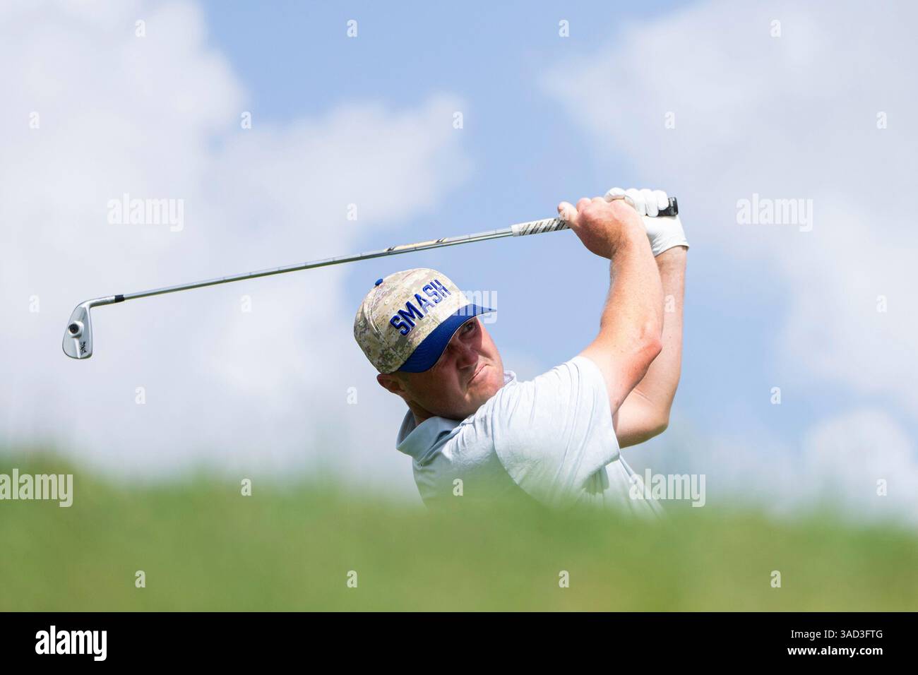 Jason Kokrak of Smash GC hits his shot during the first round of LIV ...