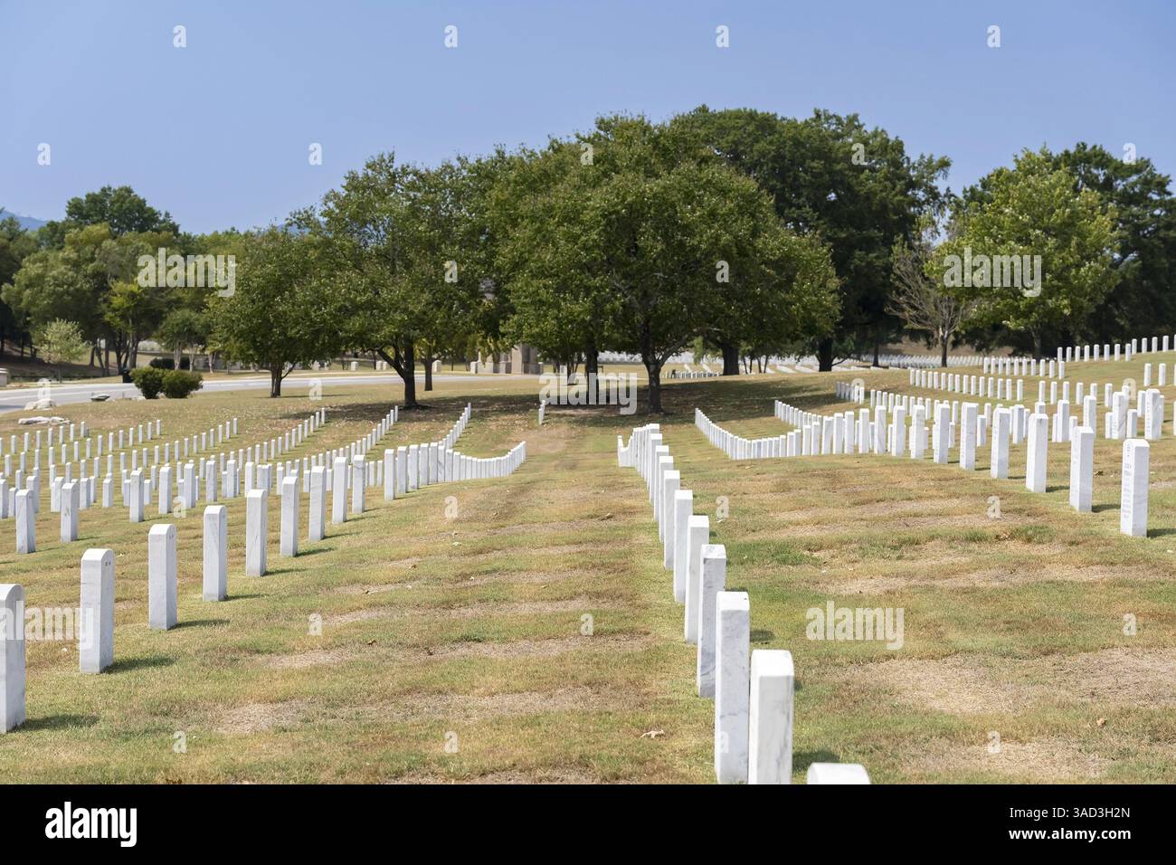 Generic views of a veterans cemetery on a serene day, featuring ...
