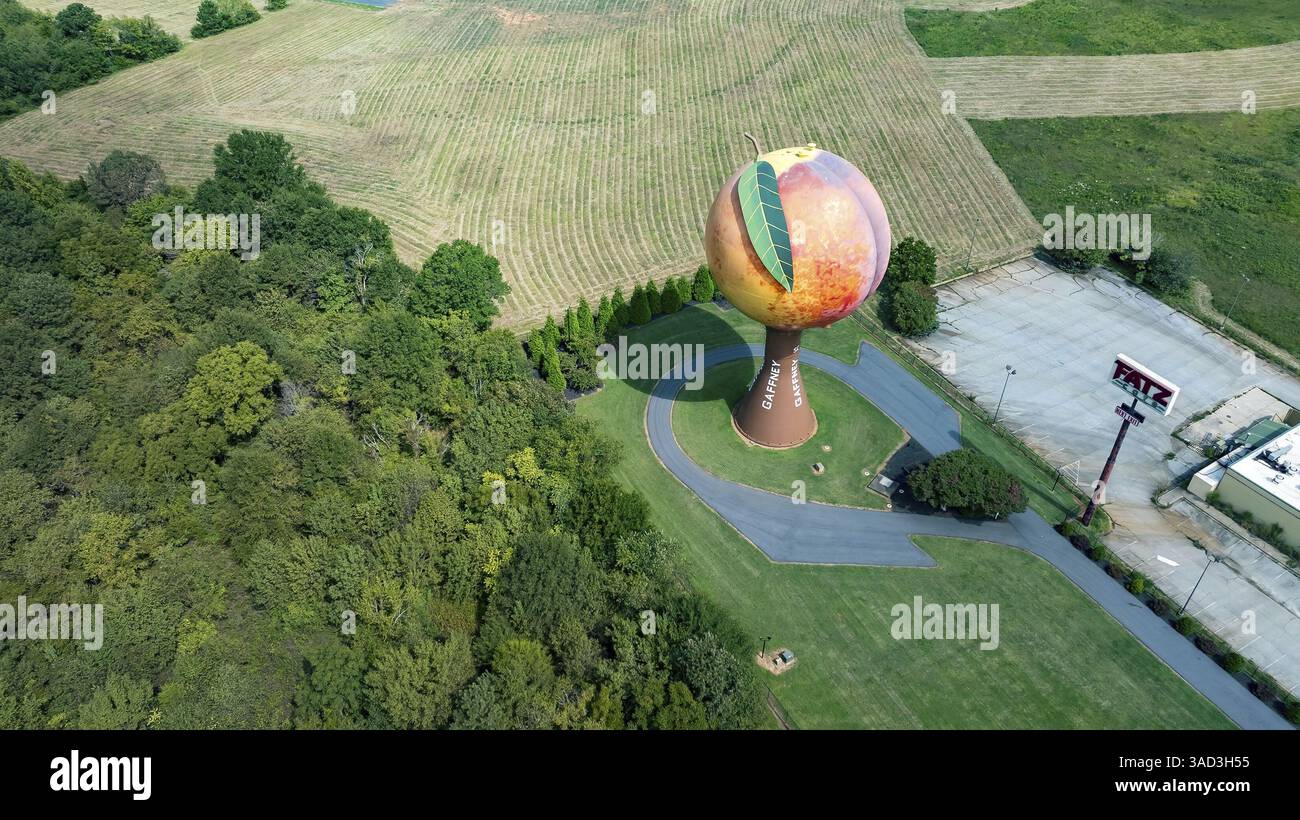 The Peachoid, a 135-foot water tower in Gaffney, SC, resembles a peach ...