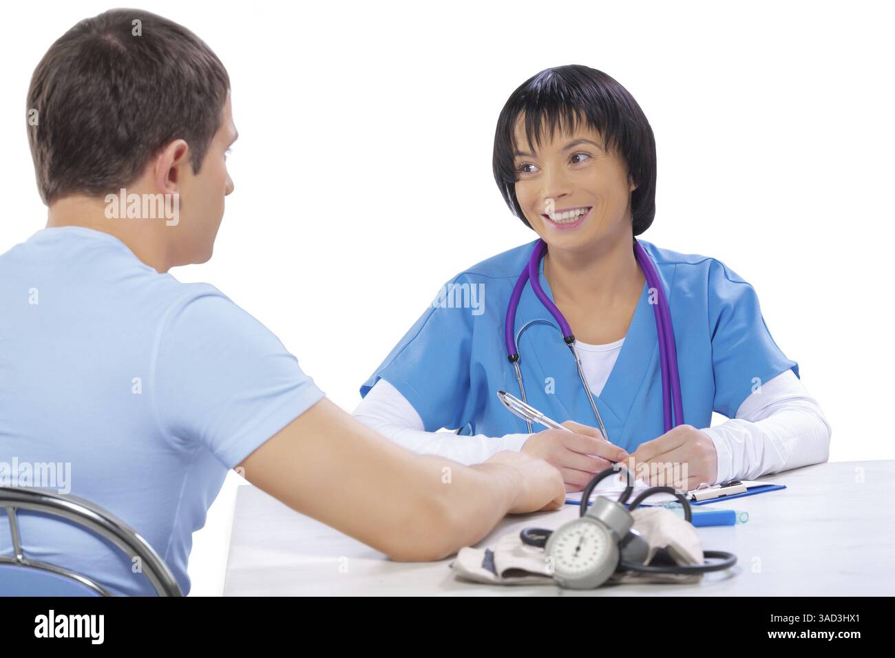 Female doctors measuring blood pressure hi-res stock photography and ...
