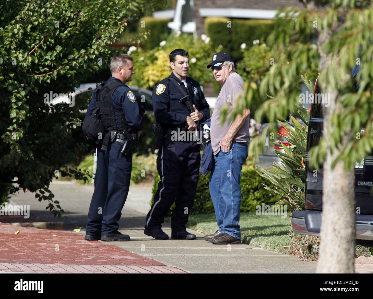 Neighborhood man talks police hi-res stock photography and images - Alamy