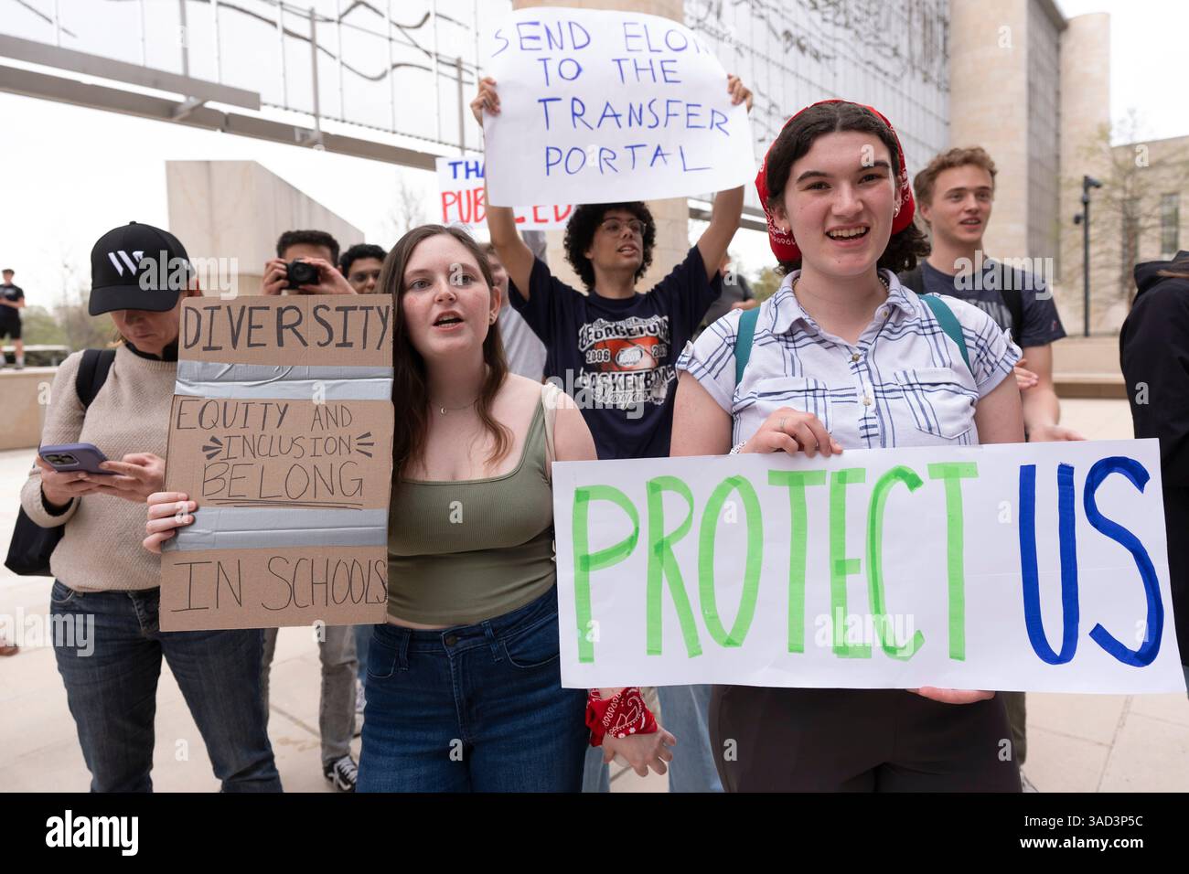 Supporters of the public school system, Nicole Perry, front left ...